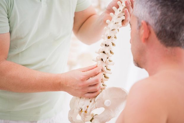 cranial-osteopathy-spine-demonstration - Epsom Osteopathic Clinic